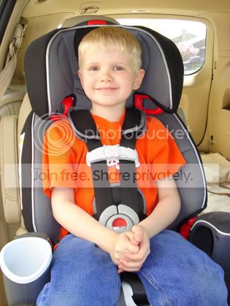 Why My First Grader Still Rides in a Harnessed Car Seat | Book Mama